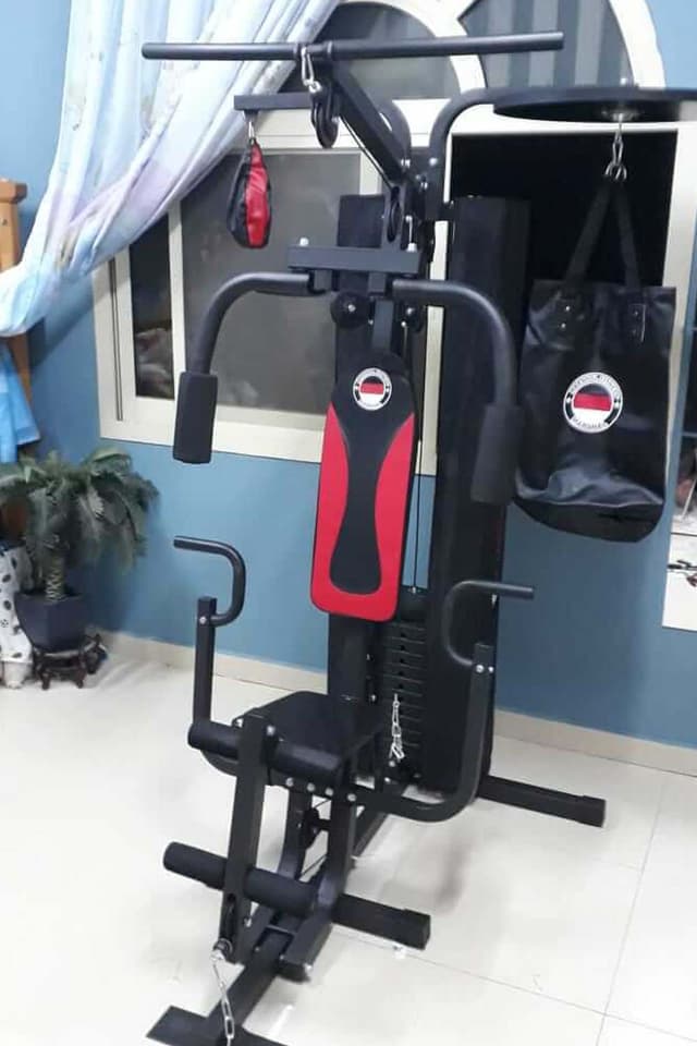 Marshal Fitness multi function exercise home gym equipment with 120 lbs weights and sand bag ...